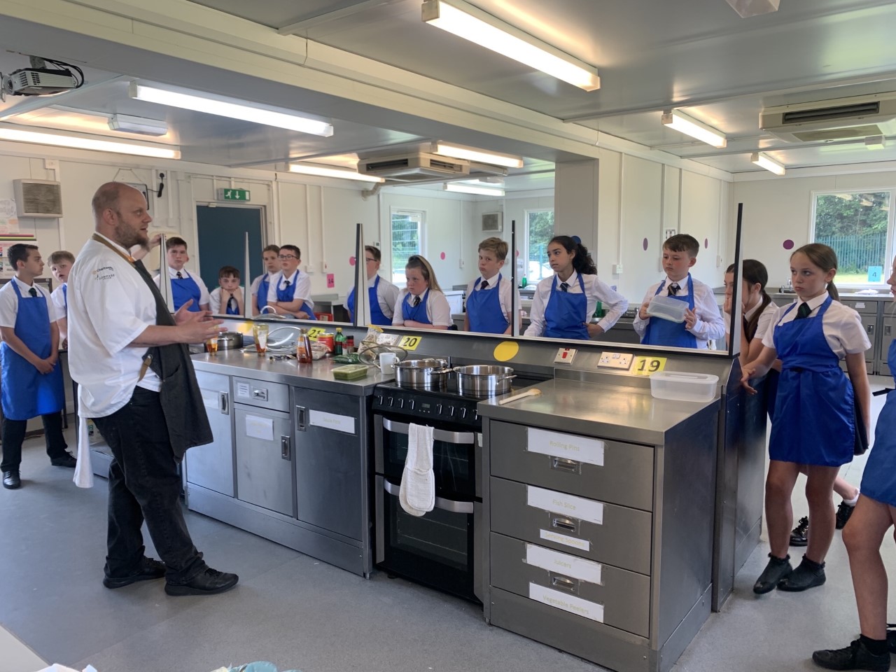 Students experience working with a professional chef - Little Lever School